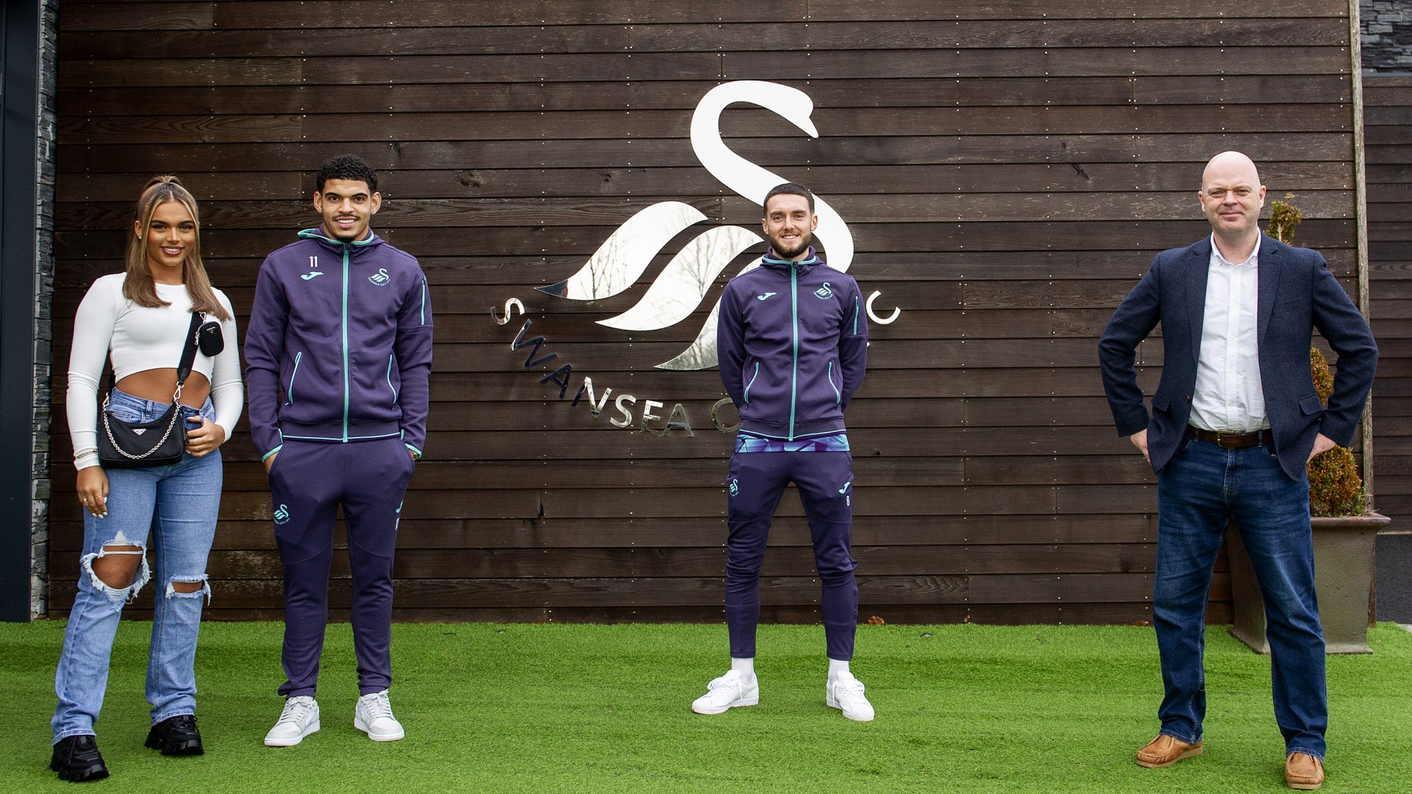 Swansea City squad provide Christmas cheer for Dylan Thomas Community ...